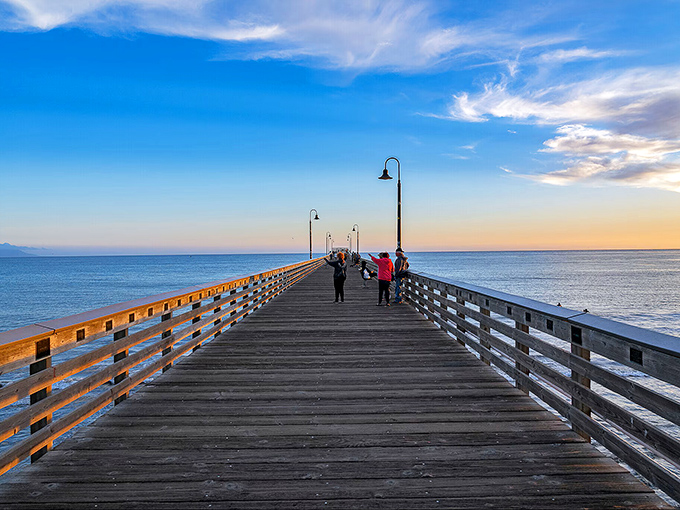 The Cayucos Pier stretches toward the horizon like a wooden runway, inviting you to walk just a little farther from ordinary life.