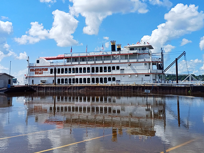 The Celebration riverboat waits patiently for passengers, a floating time machine ready to deliver Mark Twain-worthy views of the mighty Mississippi.