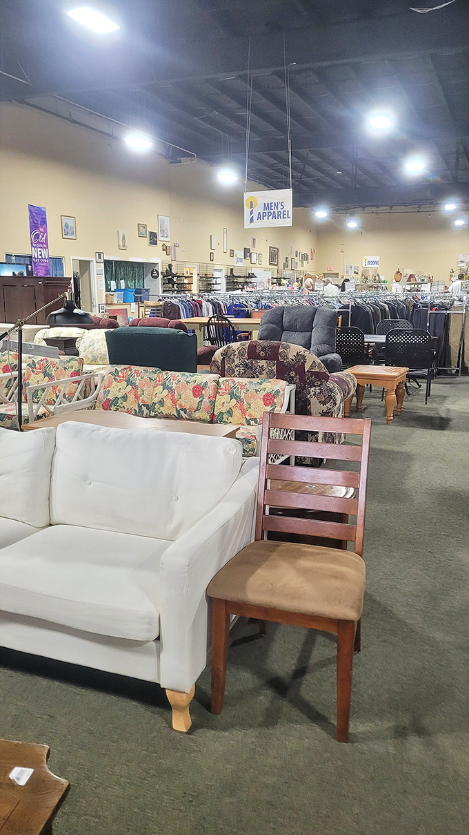 The furniture section: where your living room's next conversation piece waits among floral patterns that have seen their share of family gatherings.