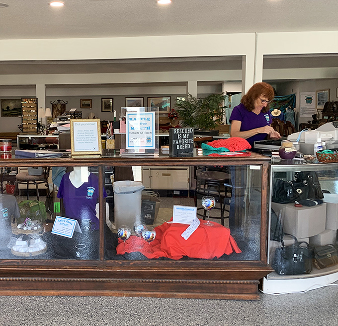 The checkout area doubles as an information station about the rescue mission, reminding shoppers their retail therapy is actually saving lives.