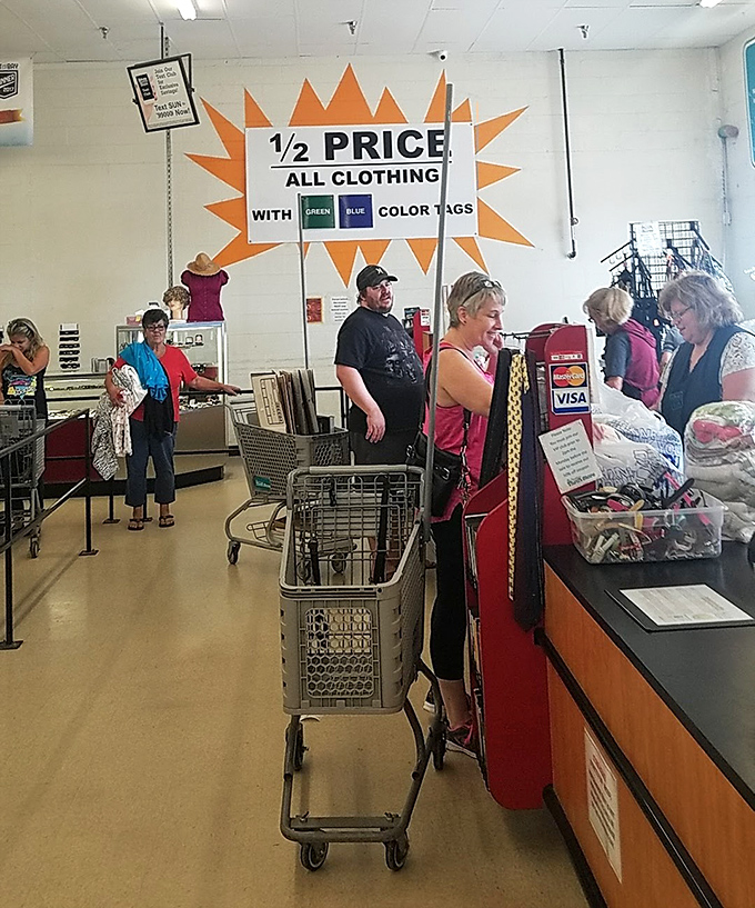 Where bargain dreams become reality! The checkout line at Sunshine Thrift is the finish line in this Olympic sport of savings.