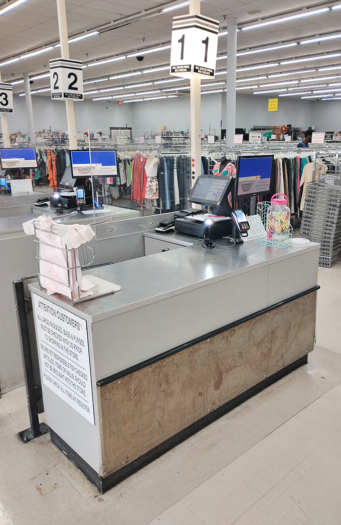 Command central where victorious hunters bring their spoils. Those numbered signs overhead guide you like retail constellations through the thrifting universe. 