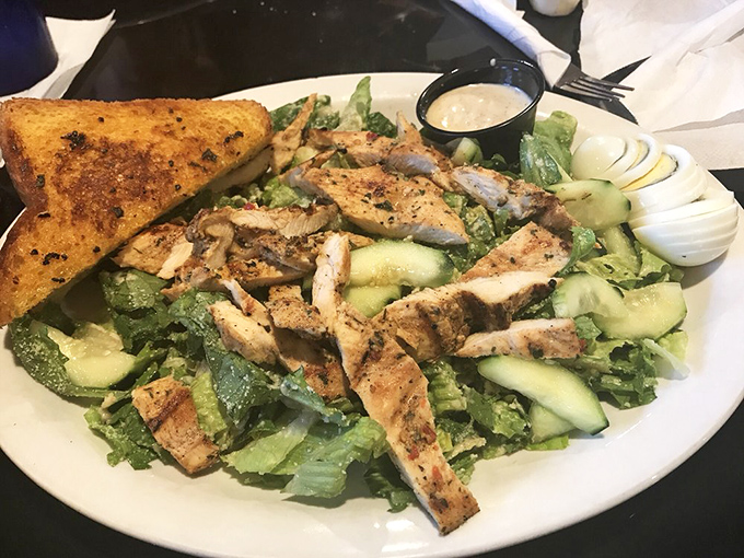 This chicken Caesar salad proves healthy-ish options can still be indulgent. That grilled chicken looks like it's been seasoned by someone who cares.