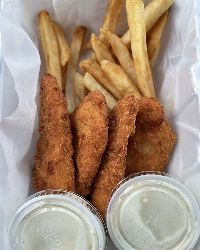 Chicken tenders and fries - proof that sometimes the best culinary experiences aren't about innovation but about execution. Comfort food perfection.