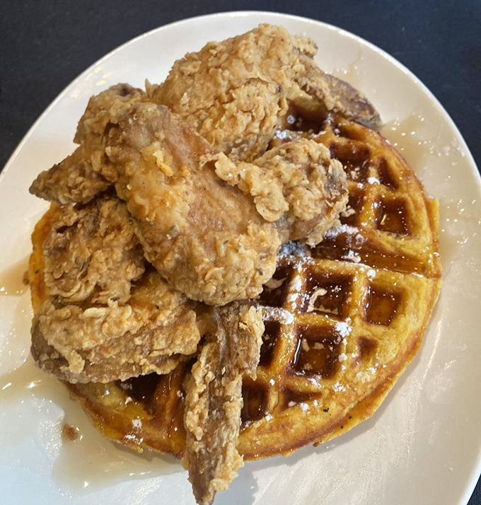 Chicken and waffles – the culinary equivalent of a perfect marriage. Sweet meets savory in a dish that makes breakfast jealous of dinner.