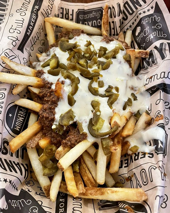 These chili cheese fries aren't messing around—they're serious business disguised as a casual indulgence.