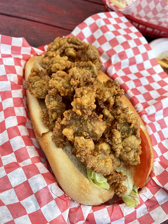 This clam po' boy is stuffed so generously, you'll need both hands and possibly a construction permit.