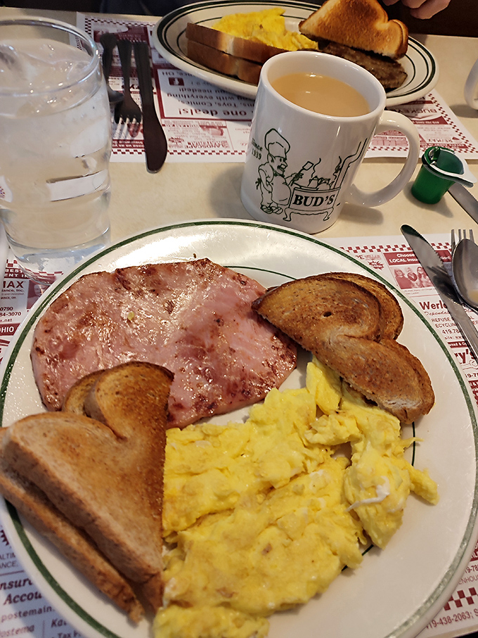 The breakfast trinity&mdash;perfectly scrambled eggs, toast with just the right amount of butter, and ham that reminds you why breakfast is worth waking up for.