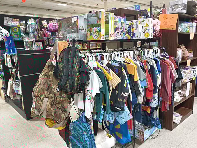 The clothing racks&mdash;where vintage tees and yesterday's fashion finds become tomorrow's retro statement pieces. That camo backpack has seen some adventures.