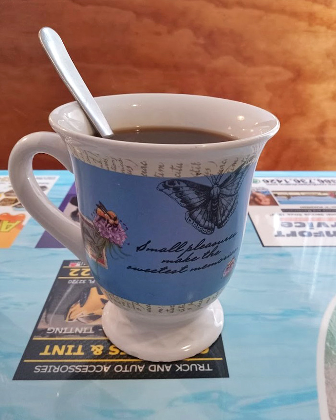 Coffee served in a mug that reminds you to appreciate life's small pleasures&mdash;like caffeine that doesn't cost half your paycheck.