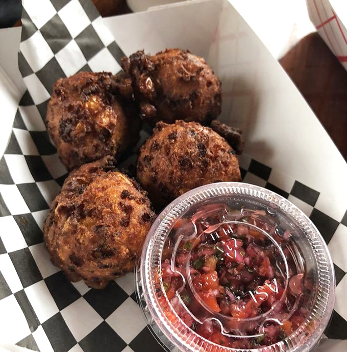 Golden-brown spheres of happiness. These fritters are what would happen if comfort food went to culinary school and graduated with honors.