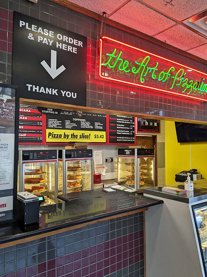 The illuminated menu board glows with possibility, each item a potential pathway to satisfaction behind that gleaming glass display.