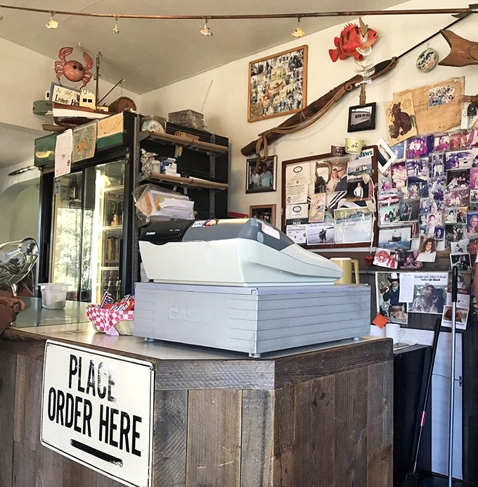The order counter&mdash;where dreams of perfect fish and chips begin their journey from ocean to plate with delicious inevitability.