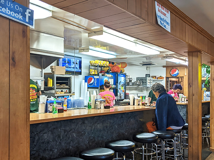 The counter where dreams come true. Those swivel stools have supported generations of happy eaters awaiting their hot dog fix.
