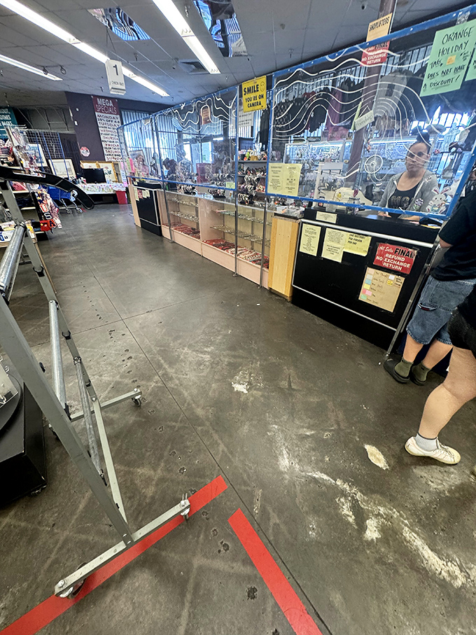The checkout counter: the finish line of your treasure hunt. Those signs probably have stories that rival the merchandise.