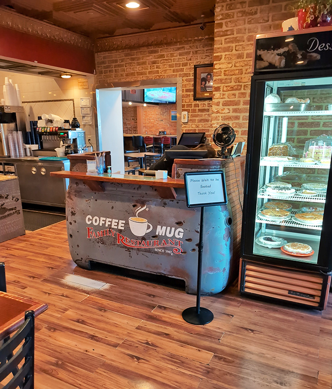 The vintage-inspired counter where coffee flows freely and the dessert case tempts you before you've even ordered your meal.