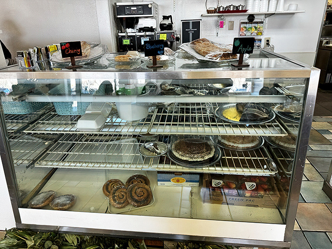 The dessert case &ndash; where willpower goes to surrender. Those cinnamon rolls are worth every extra minute on the treadmill.