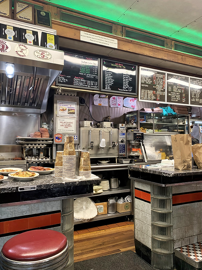 The beating heart of Summit Diner&mdash;where coffee urns gleam, orders fly, and the organized chaos of breakfast service unfolds beautifully.