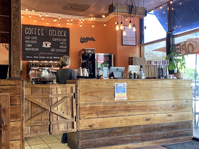 A counter crafted from reclaimed wood where coffee magic happens. This is breakfast's front row, where regulars exchange knowing nods about the day's specials.