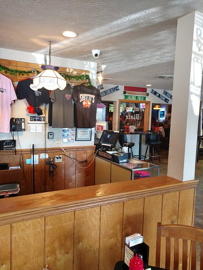 The counter area showcases local pride with pennants and memorabilia&mdash;a mini museum of community spirit alongside the cash register.