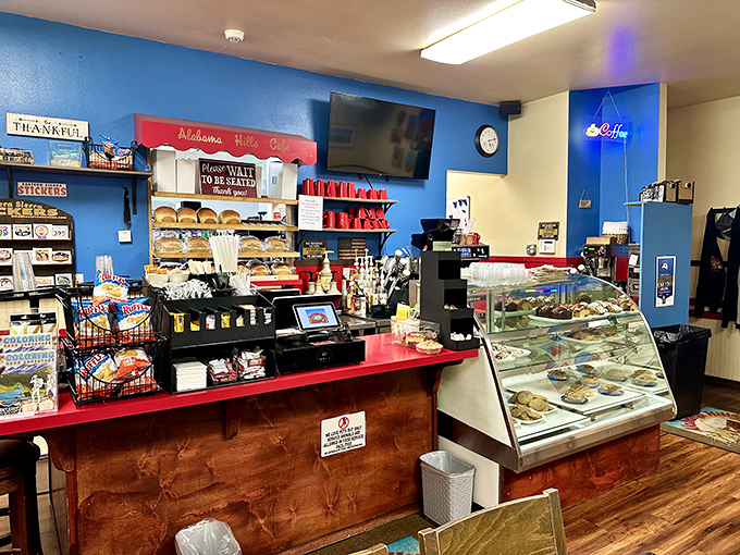 The counter area showcases freshly baked goods that silently judge you for even considering ordering "just coffee."