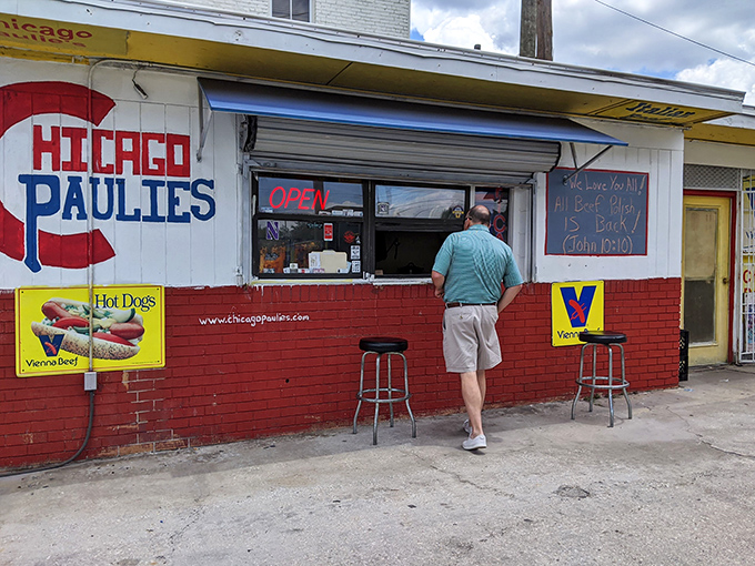 The counter seats—where strangers become friends united by the universal language of "this sandwich is worth the mess."