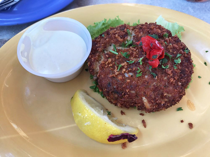 A crab cake with so much actual crab it makes Maryland nervous. That golden crust is just showing off at this point. 