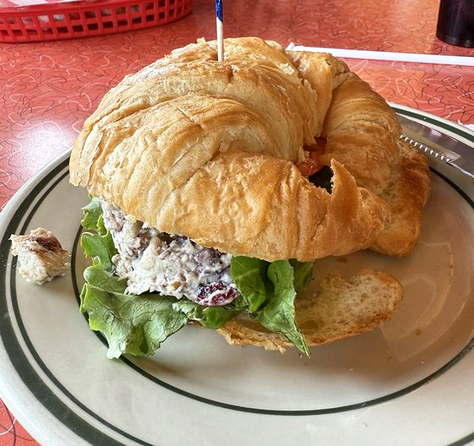 Chicken salad on a croissant&mdash;where buttery pastry meets creamy filling in a sandwich that's both elegant and satisfyingly substantial.