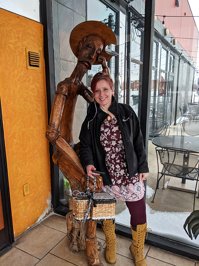 Even the wooden Don Quixote statue can't resist posing with happy customers outside this Greenville culinary destination.