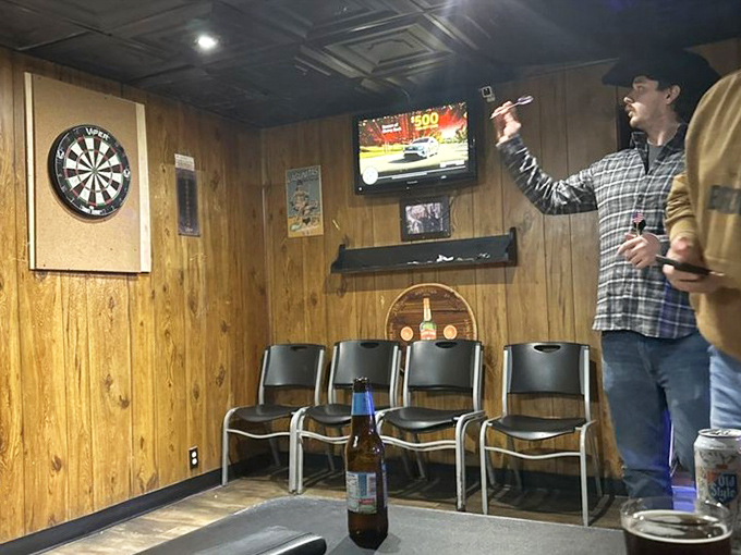 The dart board corner &ndash; where friendly competitions have been settling debates and entertaining patrons for years over cold bottles and hot pizza.