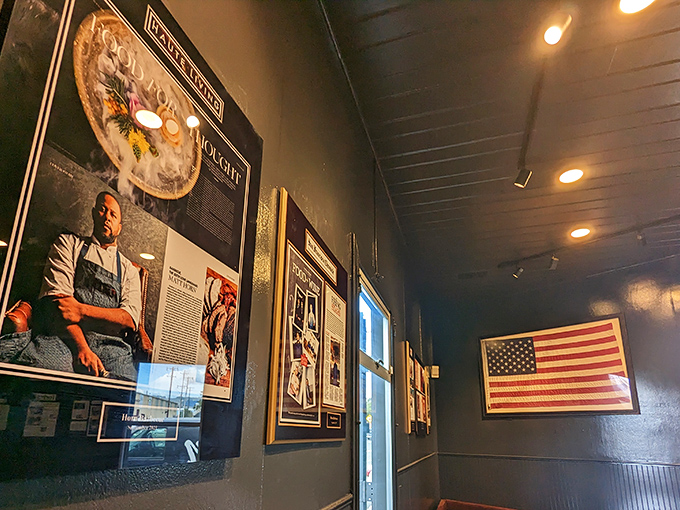 The walls tell stories of barbecue heritage and American tradition, creating an atmosphere as rich and layered as the flavors on your plate.