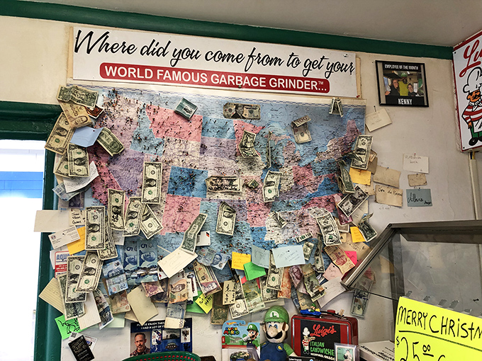 Dollar bills and postcards tell tales of grateful customers who've traveled far for Luigi's famous creations.