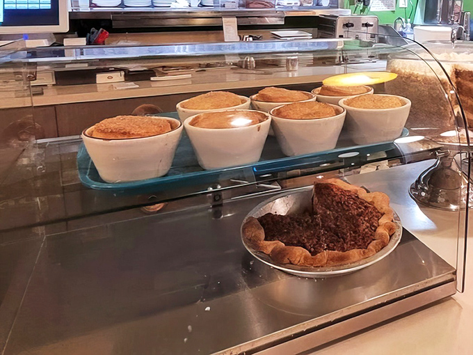The dessert case&mdash;temple of temptation where willpower goes to die. Those pies aren't just desserts; they're reasons to save room.