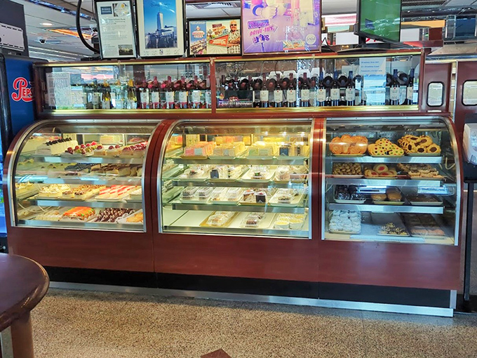 The dessert case&mdash;where willpower goes to die and "I'll just have coffee" turns into "I'll have that chocolate cake, please."