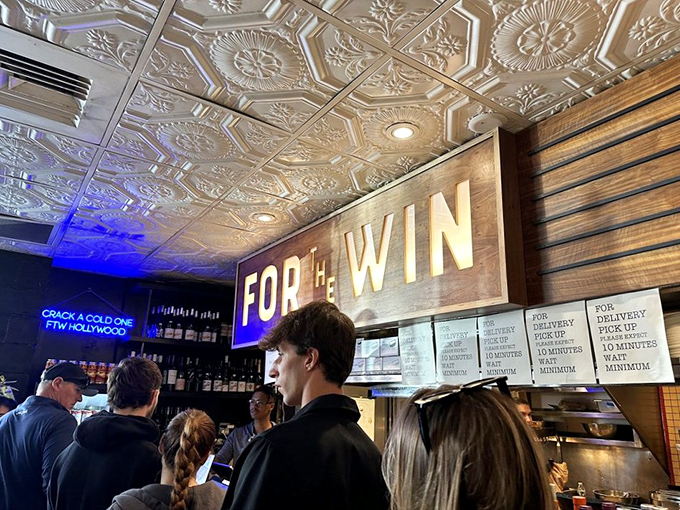 Where strangers become friends over shared burger revelations. The communal dining experience we didn't know we were missing.