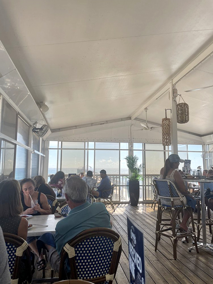 The dining room where strangers become friends over the shared religion of fresh seafood and ocean breezes.