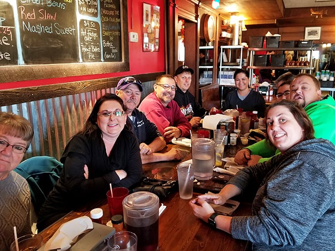 A group of diners experiencing what might be the happiest moment of their week. That look of barbecue bliss is universal.