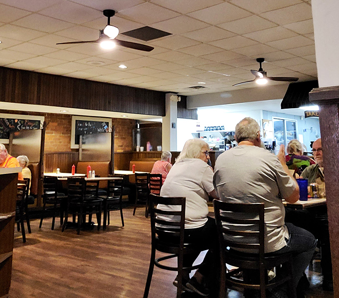 Regulars fill these seats not just for the food, but for the familiar rhythm of a place where everybody really does know your name.