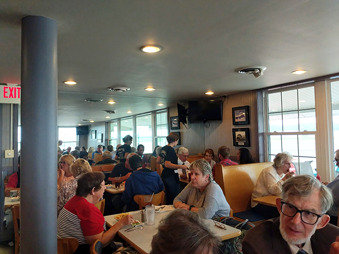 A full house is the best review any restaurant could ask for. These diners aren't just eating&mdash;they're participating in a community tradition.
