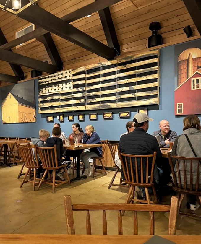 The wooden American flag and barn mural remind you that great barbecue is as patriotic as it is delicious.