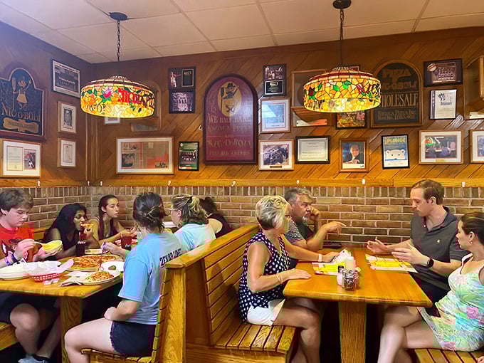 Happiness is a table full of people sharing pizza &ndash; these folks clearly understand life's simple pleasures.