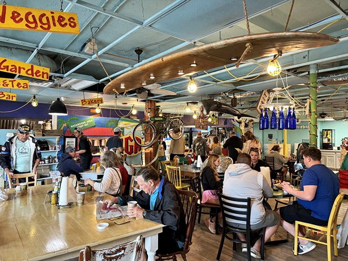 Beneath surfboards and string lights, strangers become temporary neighbors, united by the universal language of good food.