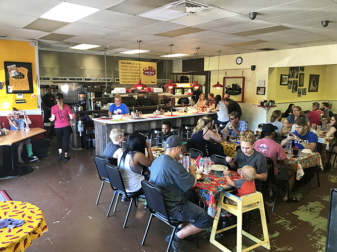 A packed house of happy diners, all experiencing that unique joy that comes only from knowing you've ordered exactly the right thing.