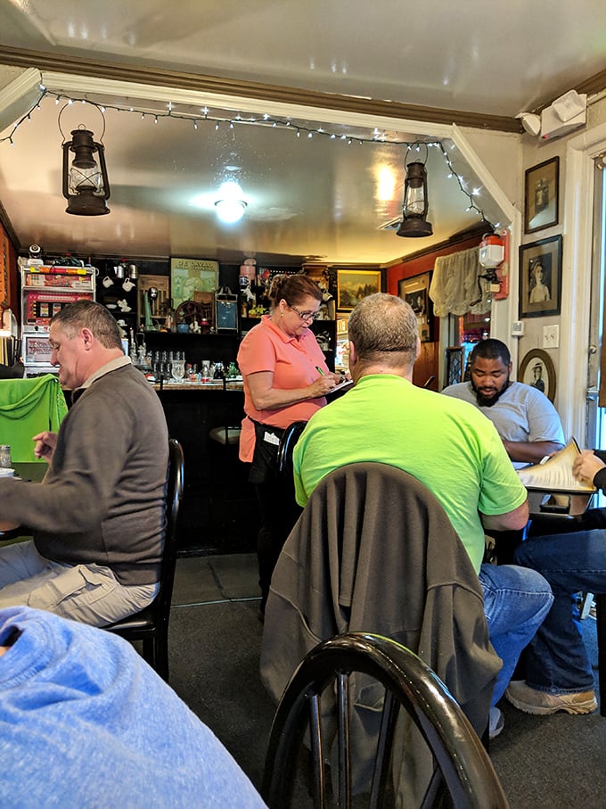 Where strangers become neighbors over plates of comfort food, sharing stories as freely as they pass the salt.