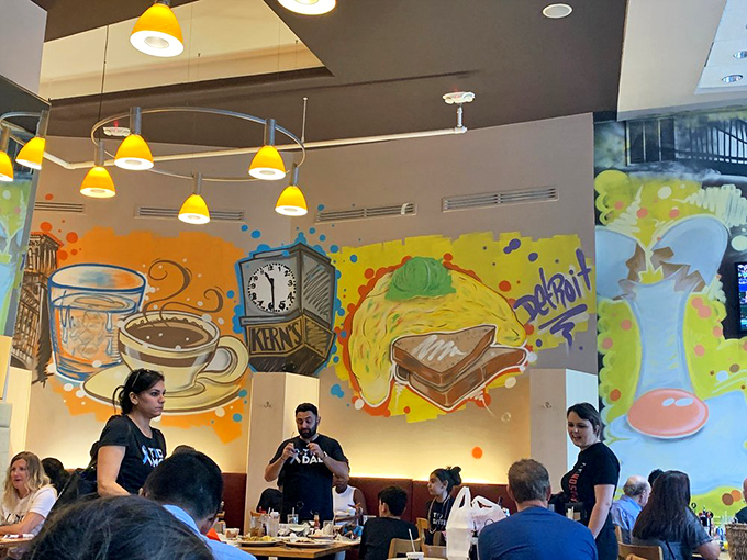 The bright, airy dining room buzzes with energy as servers navigate between tables, delivering plates that look too good to eat. Almost.