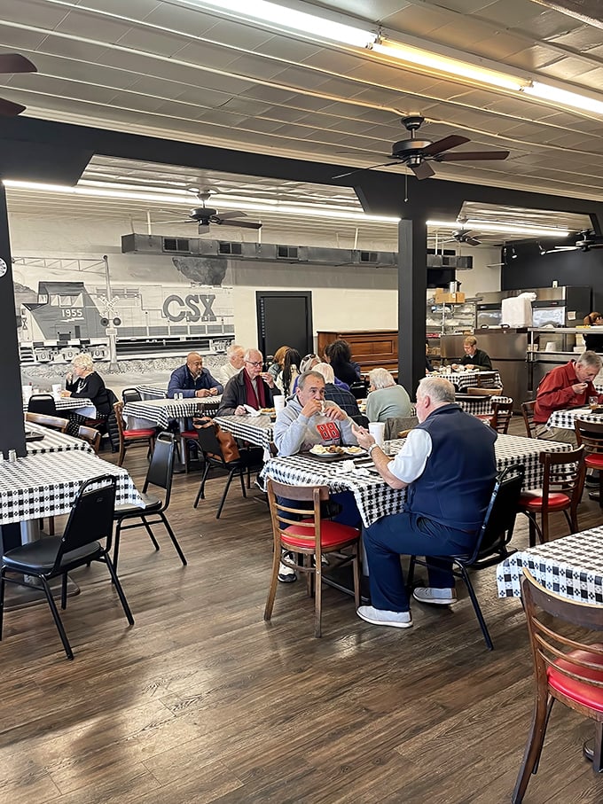 Regulars gather around checkered tablecloths, solving the world's problems over meatloaf and mashed potatoes. Some tables have witnessed decades of conversation.