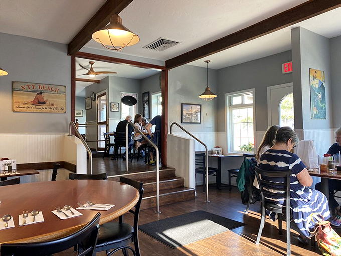 Multi-level dining creates the feeling of eating in someone's beach house. Sunlight streams in, highlighting conversations and seafood celebrations.