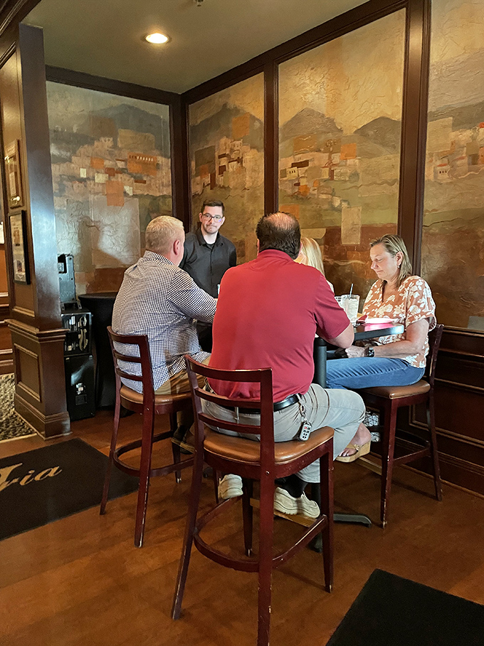 The corner table&mdash;where friendships deepen, deals are made, and nobody's checking their phone because the conversation is too good.