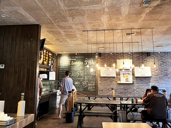 The lunch crowd knows what's up, gathering around communal tables like it's a delicious family reunion.