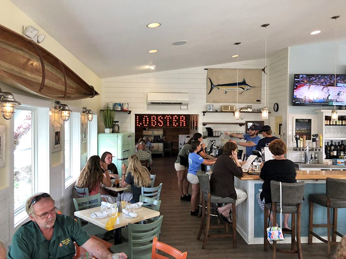 The dining room buzzes with the symphony of satisfaction&mdash;clinking glasses, happy chatter, and the occasional gasp of seafood delight.